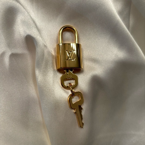 Louis Vuitton | Accessories | Lv Lock And 2 Keys 3 | Poshmark